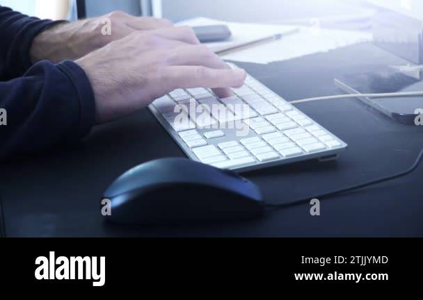 Fingers typing desktop computer keyboard Stock Video Footage - Alamy