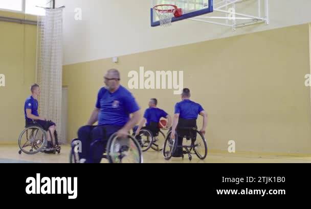 Wheelchair Basketball Game: Players Compete, Dribbling Ball, Passing ...