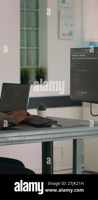 Vertical video: Database programer writing source code and script on ... Vertical video: Database programer writing source code and script on ...