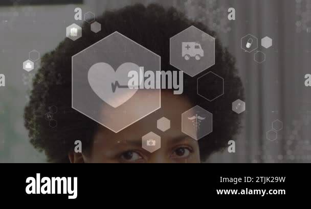 Animation of falling medical icons over african american female doctor ...