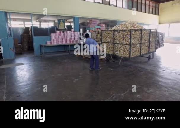 Bangalore,India-April 5,2016: A worker pulling the mesh trolley filled ...