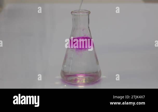 Mixing colored solution with a magnetic stirrer. Formation of a ...