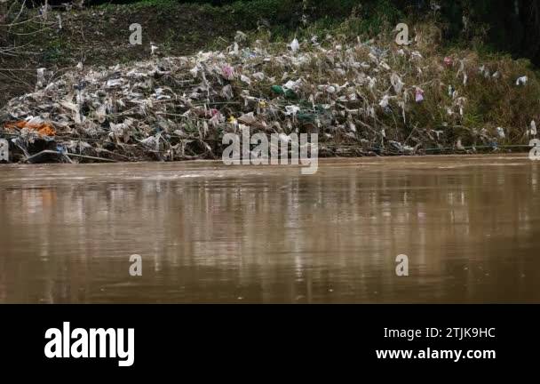 Garbage in river Stock Videos & Footage - HD and 4K Video Clips - Alamy