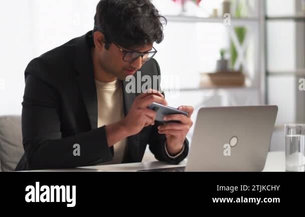 Virtual addiction. Male gamer. Digital technology. Smart casual man ...