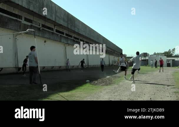Inmates playing Soccer at the Yard of Olmos Maximum Security Prison, La ...