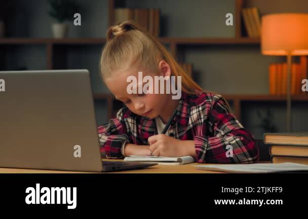 Caucasian primary school child little smart girl kid pupil study online ...