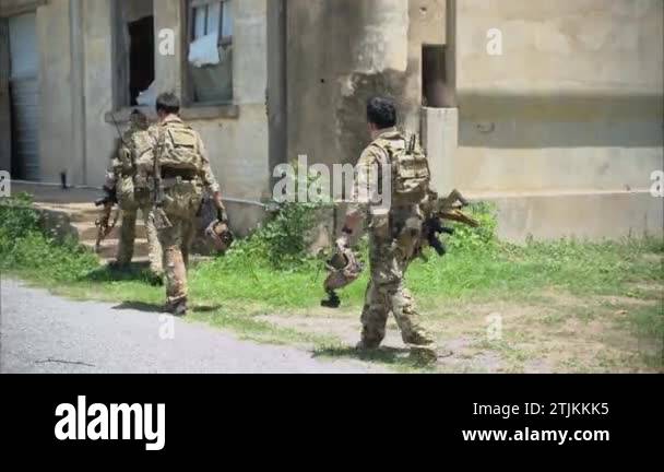 Army soldier in protective combat uniform, Soldier with rifle in forest ...