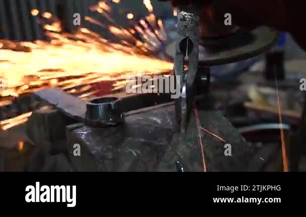 cutting metal and making custom parts for installing a car engine Stock ...