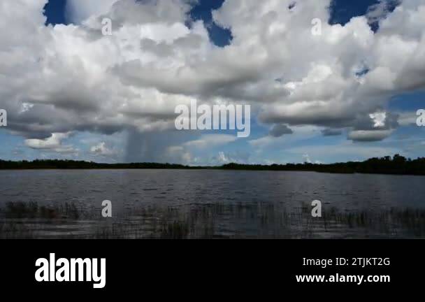 Timelapse of cumulus cloud formation and rain showers over Nine Mile ...