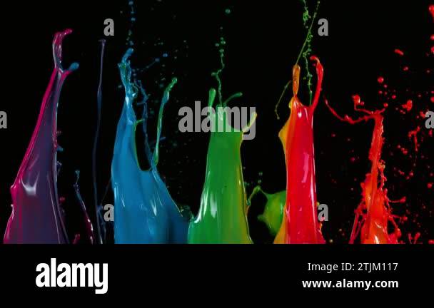 Colorful Paint Splashes in Super Slow Motion Isolated on Black ...