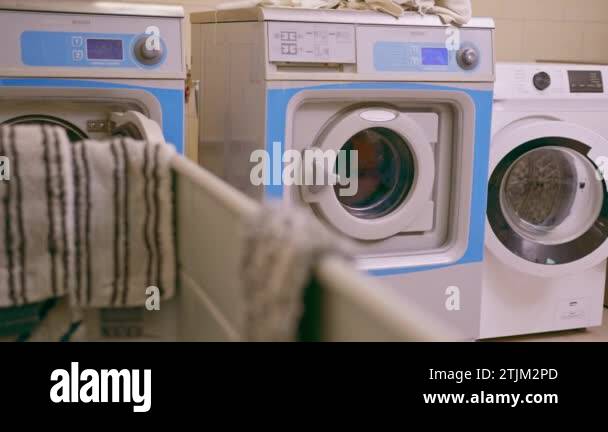 industrial washing machine hotel laundry service laundry dryer concept ...
