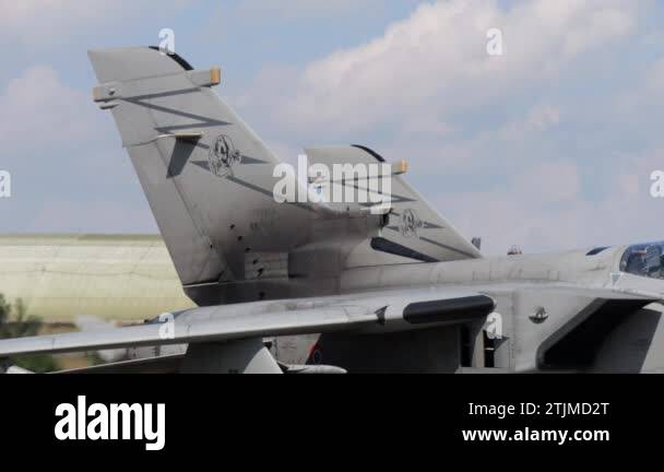 Ghedi Italy SEPTEMBER, 8, 2022 Tail of military jet airplanes with a ...