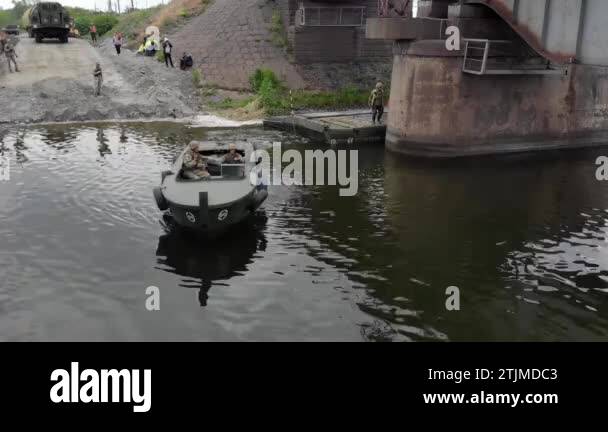 Pontoon bridge of the Ukrainian army. Installation of a temporary ...