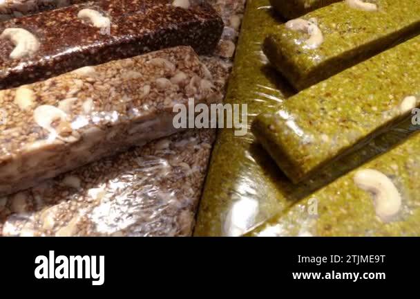 Sweet dessert nougat bars with nuts being sold in the Medina of ...