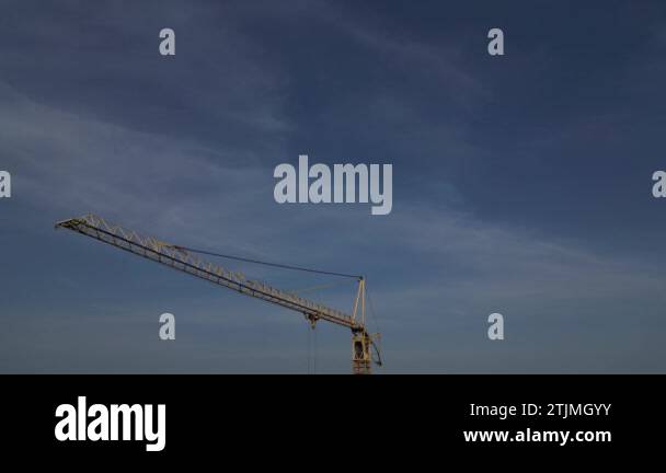 the camera zooms in and out of the high-rise crane. checking the crane ...