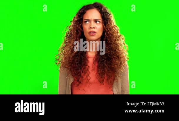 Confused, question and woman in green screen studio, angry and ...