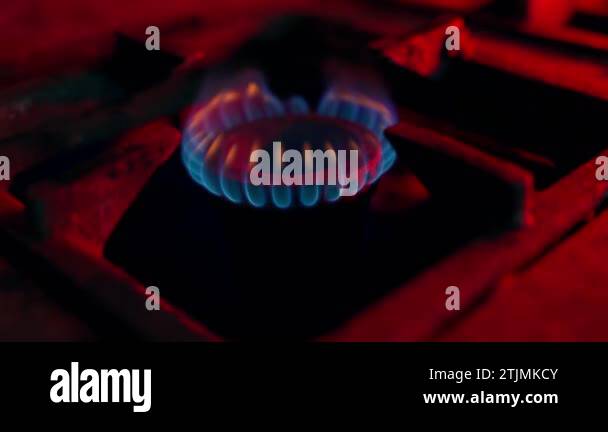 Flashing alarm lights and gas burning with a blue flame in an old ...