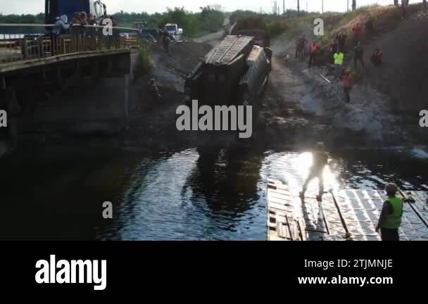 Pontoon bridge of the Ukrainian army. Installation of a temporary ...