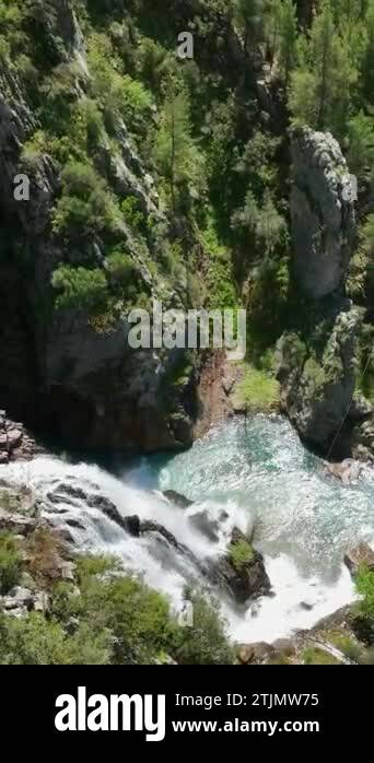 Join us on a cinematic journey to the azure falls as the drone captures ...