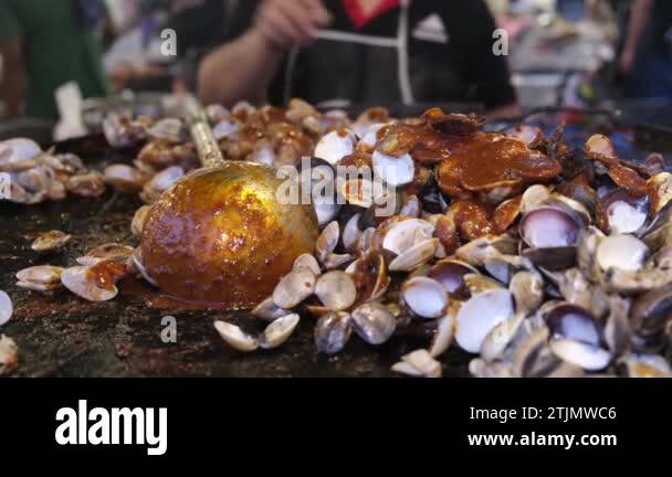 Batu Kawan, Penang, Malaysia - Aug 21 2022: Delicious baked seashell ...