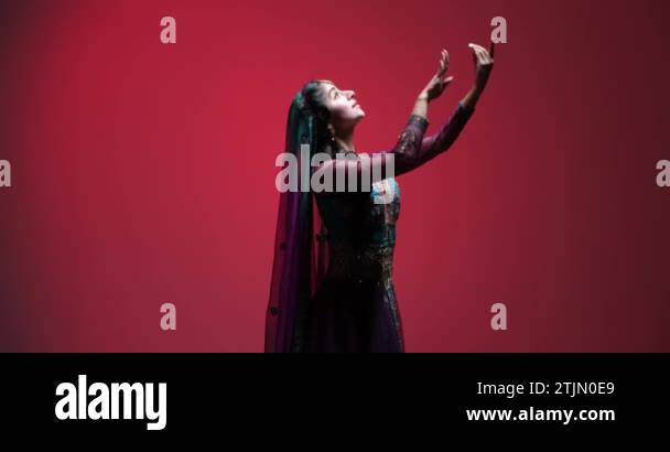 Young Indian woman showings her skills in the traditional art of Indian ...