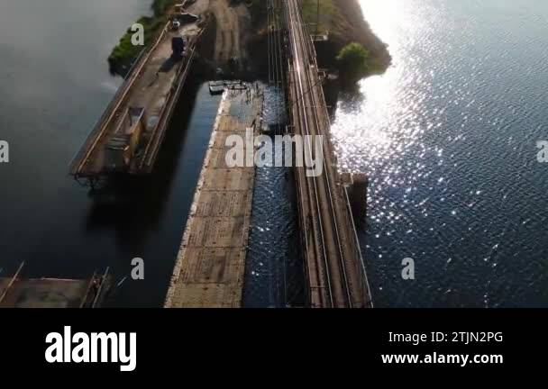 Pontoon bridge of the Ukrainian army. Installation of a temporary ...