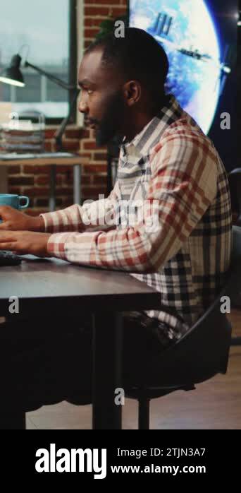 Vertical video: Young creative developer working on 3d engineering or ...