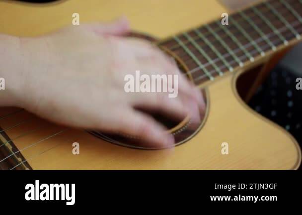 Plucking strings of a guitar Stock Videos & Footage - HD and 4K Video ...