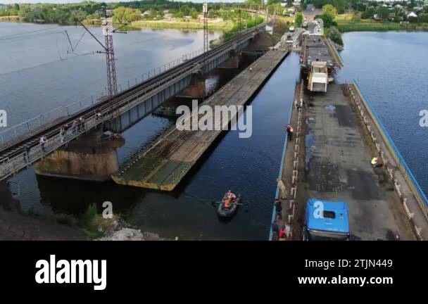 Pontoon bridge of the Ukrainian army. Installation of a temporary ...