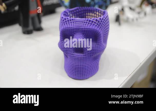 Object prototype of human skull printed on 3D printer from melted ...