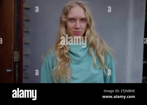 Angry offended woman and staring at camera with sceptical and ...