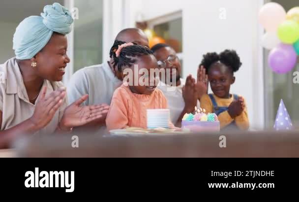 Birthday, kids and party for blowing candles with black family in ...