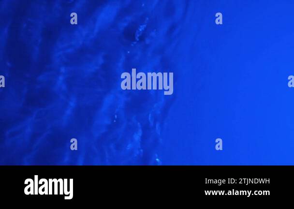 Neon Blue Water gradient texture with drops, splashes and waves ...