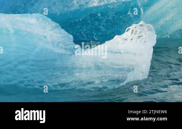 Pure blue ice in arctic. Icebergs breakaway from glacier in Iceland ...
