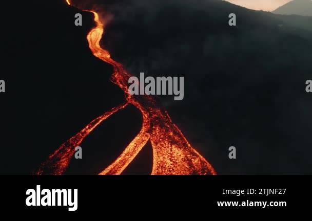 Volcanic eruption on the peninsula. Flowing lava and craters. An ...