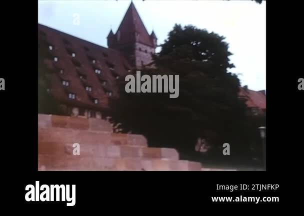 nuremberg , germany march 1970: buildings with traffic in a city in ...