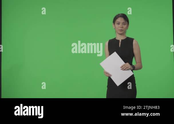 TV Weather Forecast Program. Anchorwoman stands in the studio against ...