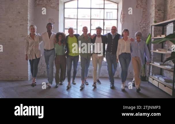 multiethnic creative business group embraced after team building in ...