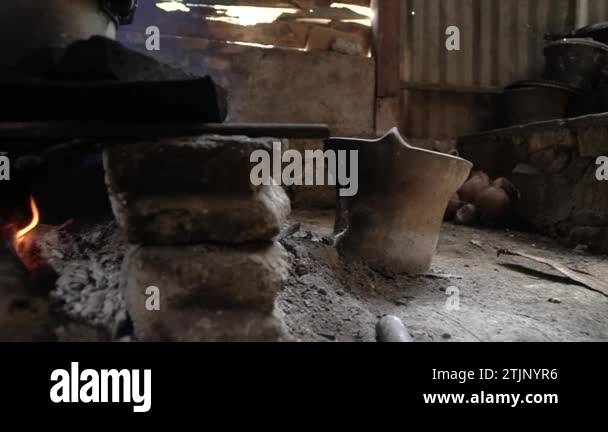 Cooking using traditional stoves in the countryside, the fuel uses wood ...