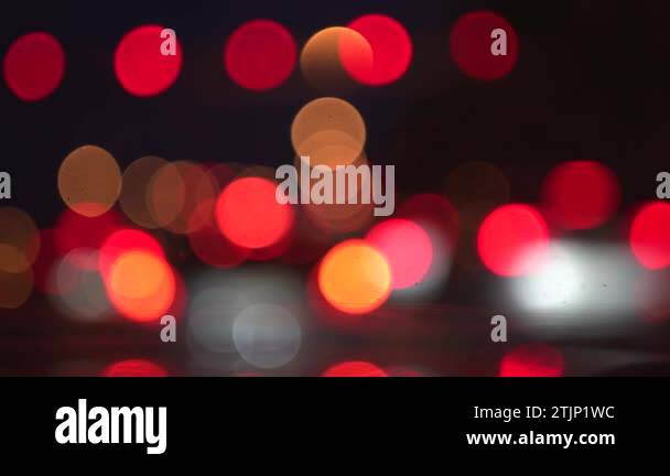 video of stopped red circles unfocused, some change to green and the ...