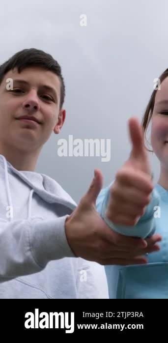 boys girl thumbs up approving like showing class be happy laughing ...