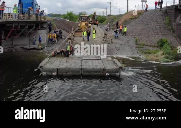 Pontoon bridge of the Ukrainian army. Installation of a temporary ...