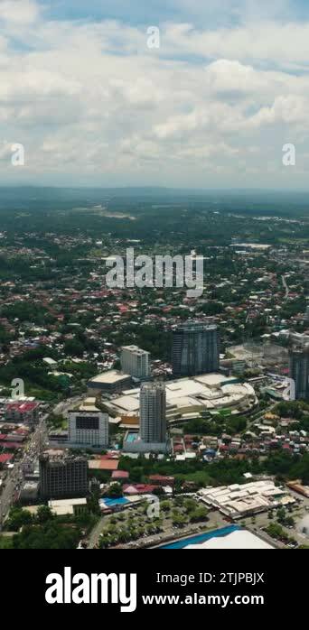 Air survey of Davao City with houses and river. Mindanao, Philippines ...