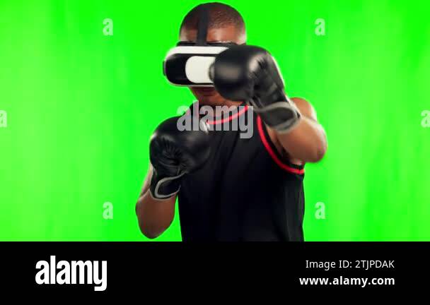 Man, boxing and virtual reality, gaming and green screen with fitness ...