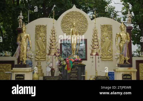 Altar with gilded religious figures in a sacred temple in Chiang Mai ...