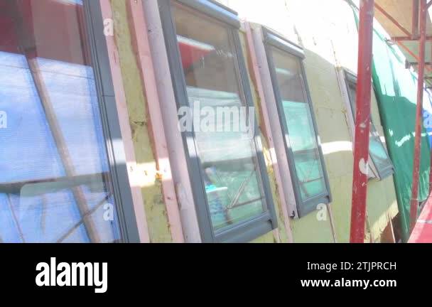 Scaffolding around the building. POV from above scaffolding ...