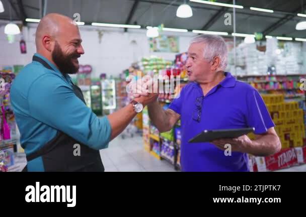 Grocery Store Boss Congratulating Employee for Good Job. High-Five ...