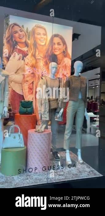 Guess Clothing store Shoes and jewelry showcase shop entrance Guildford ...