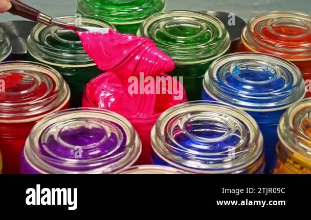 stirring pink color.Use a trowel to stir the mass in a clear glass ...