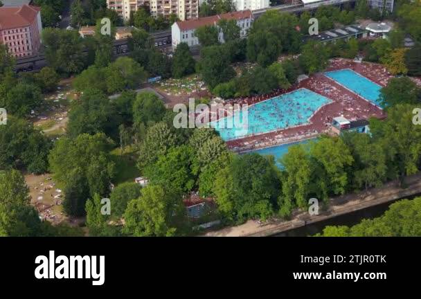 Packed over crowded public swimming pool Prinzenbad, city Berlin ...